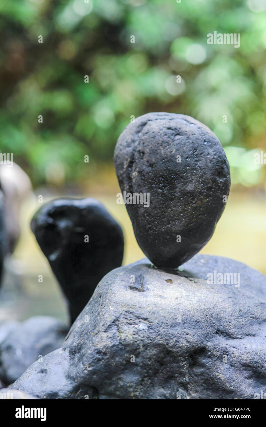 Pebble stones on nature bokeh background - SPA Concept Stock Photo - Alamy