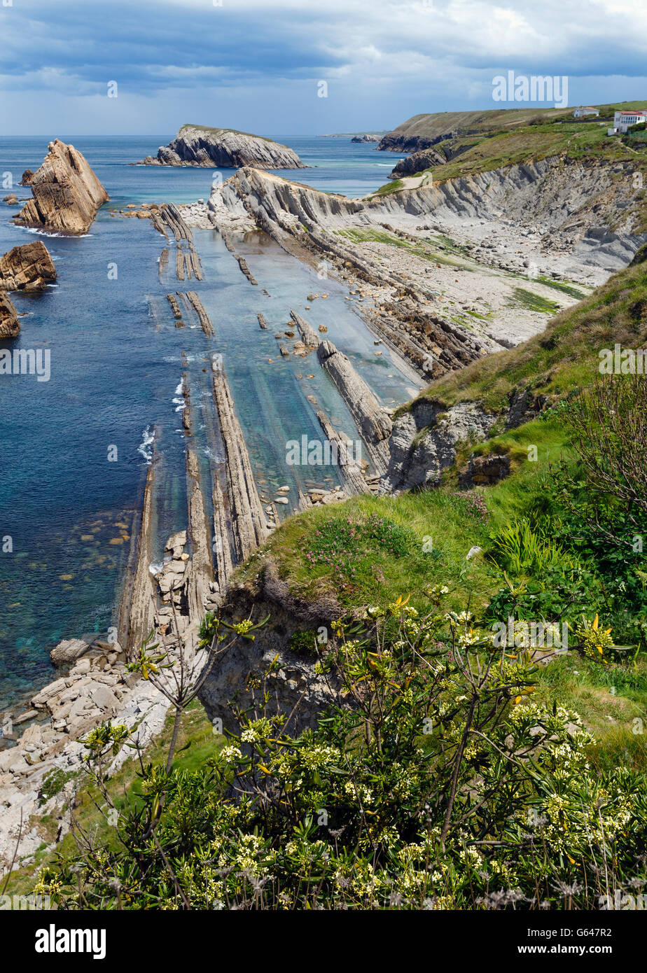 Atlantic ocean rocky coastline near Portio Beach, (Pielagos, Cantabria ...
