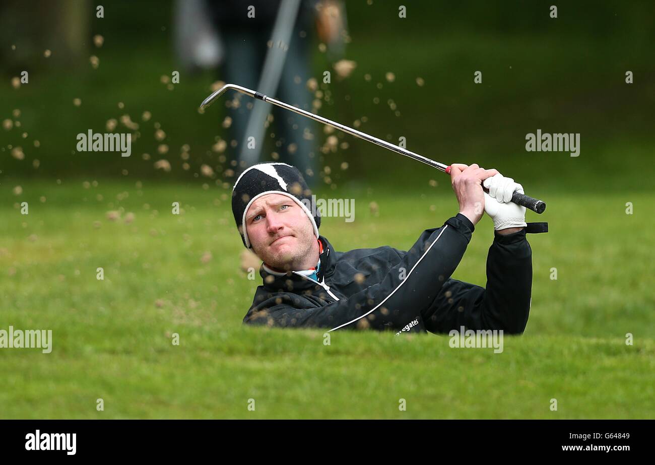 England's James Whatley plays out of the bunker during Day Two of the ...