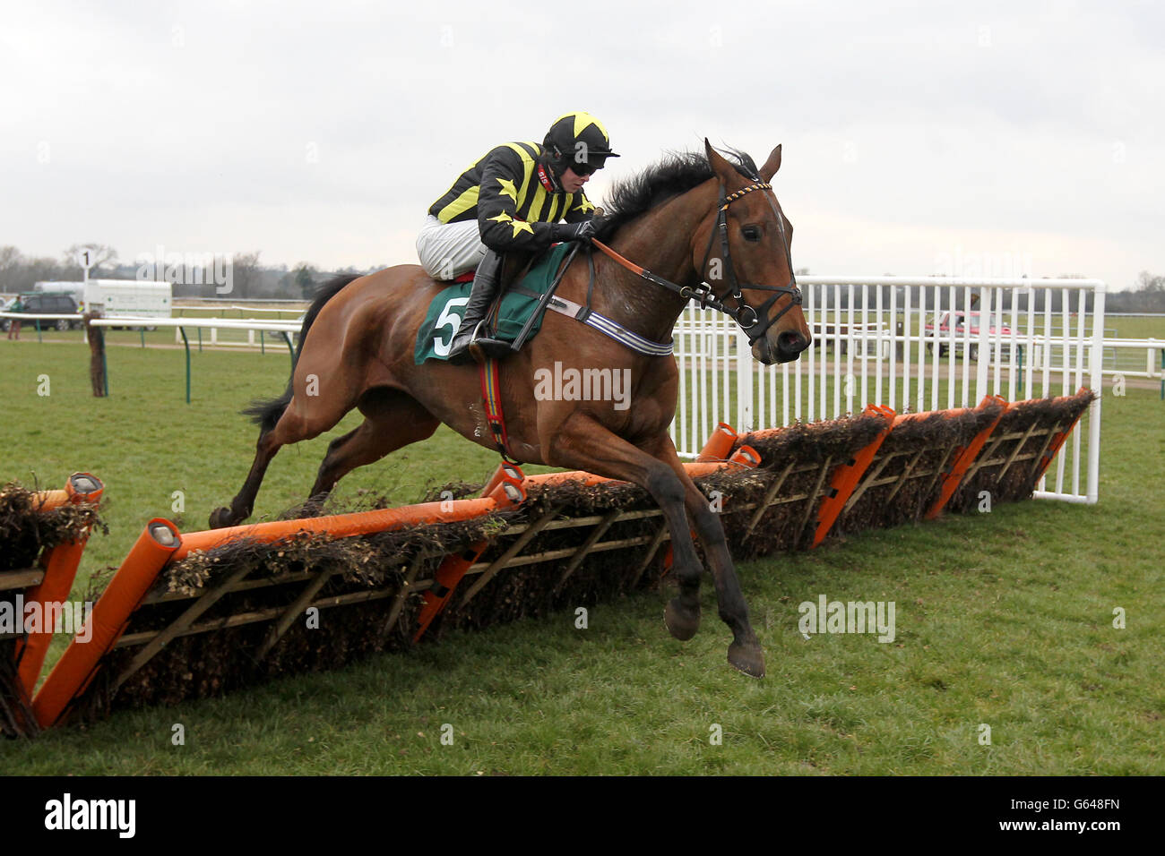 Horseracing races full length jumping jumps jumps fence hurdle action ...