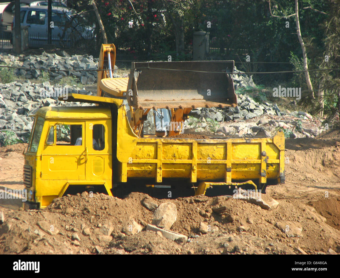 Dumper truck at a construction site in India Stock Photo - Alamy