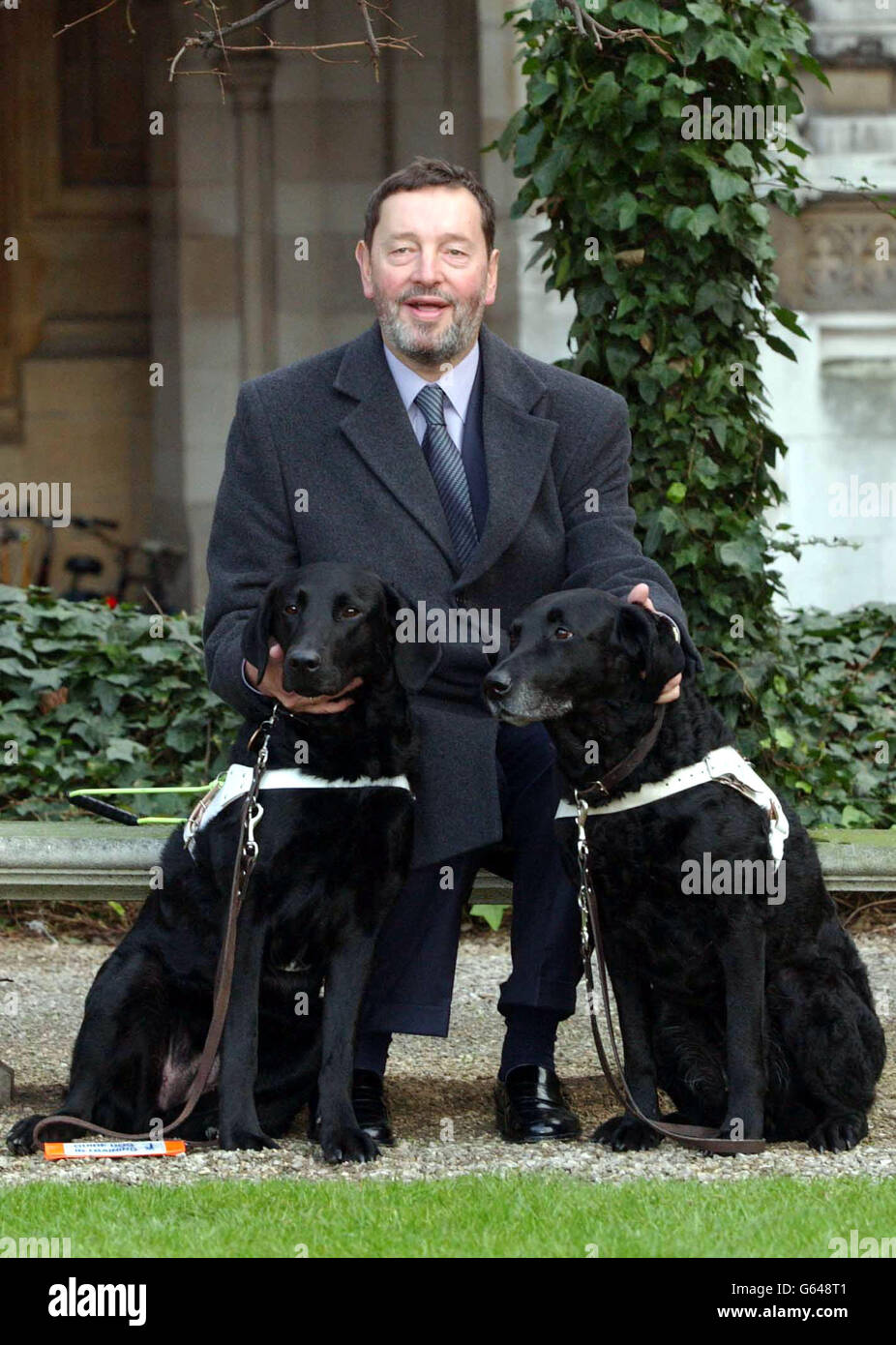 Home Secretary David Blunkett with his new guide dog Sadie (left) and ...