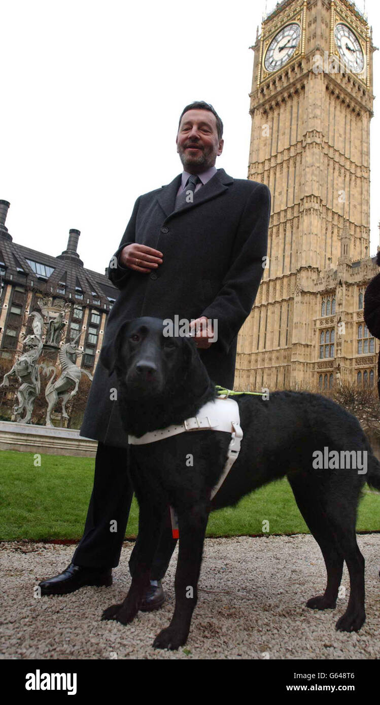 Home Secretary David Blunkett introduces his new guide dog Sadie to the ...