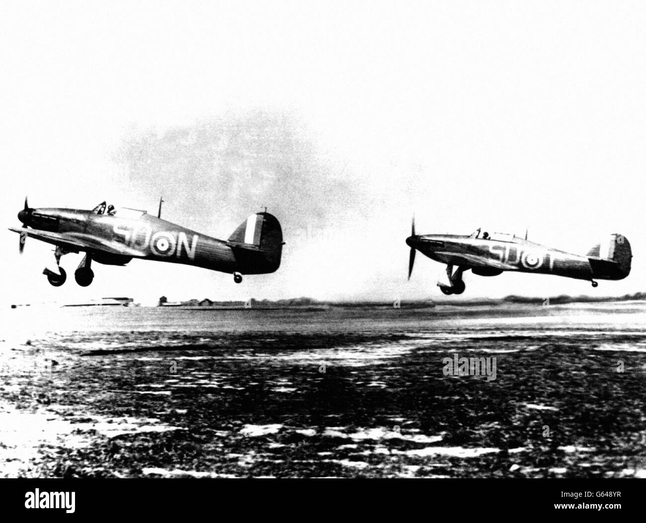 Two RAF Hawker Hurricane MK1 fighters from RAF 79 Squadron taking off ...