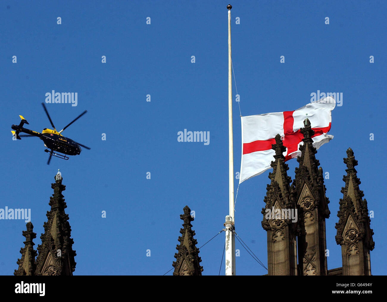 A police helicopter circles Manchester Cathedral ahead of the funeral ...