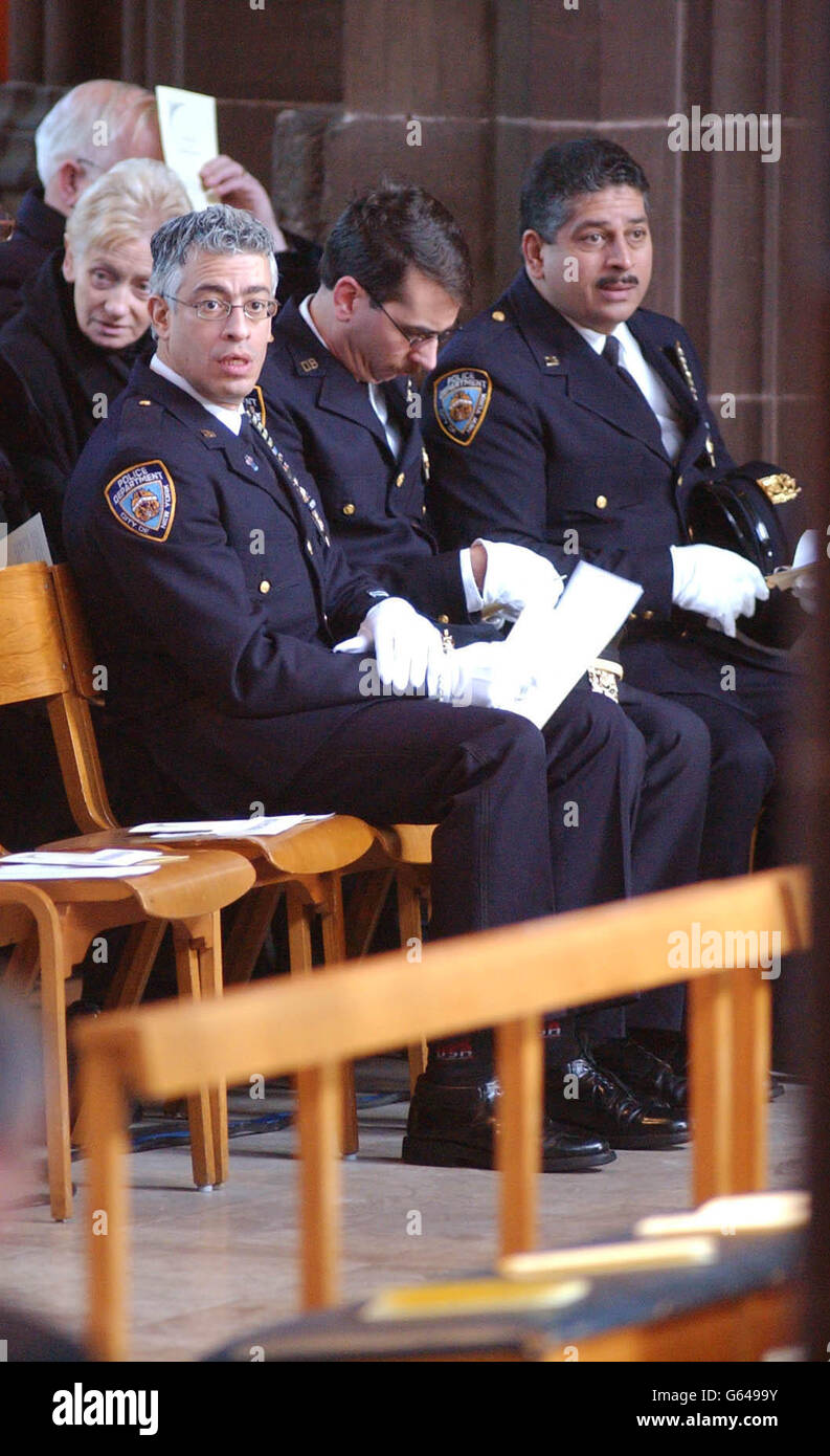 New York Police Department officers attend the funeral service of ...