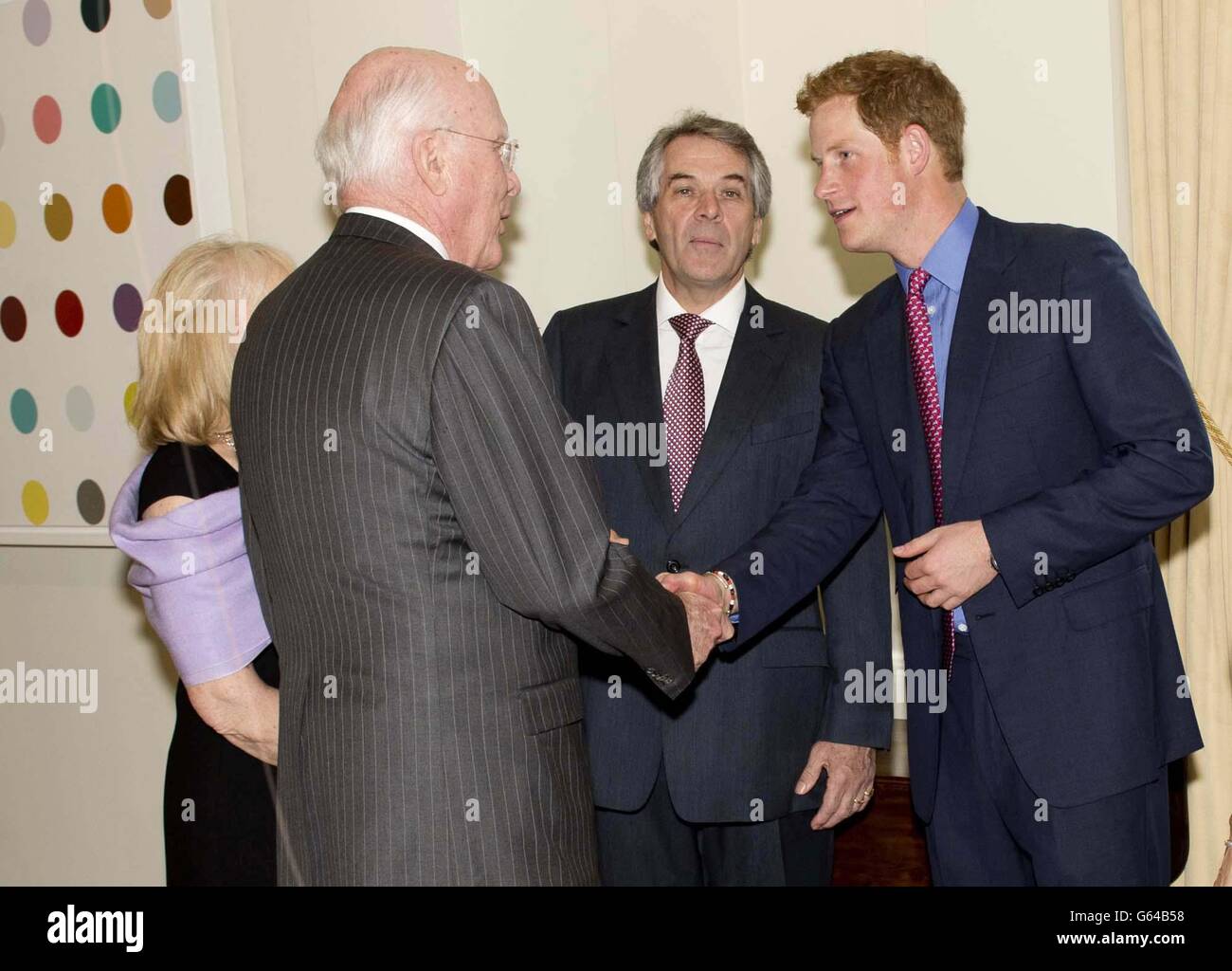 Prince Harry meets Senator Patrick Leahy while greeting attendees ...