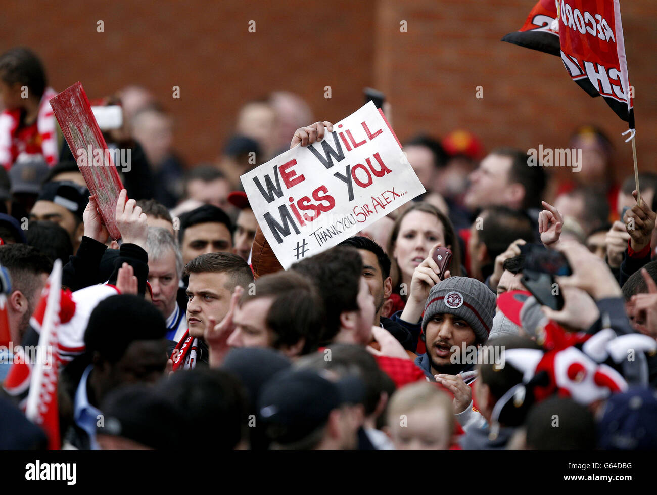 Manchester United fans with banners for Sir Alex Ferguson during the ...