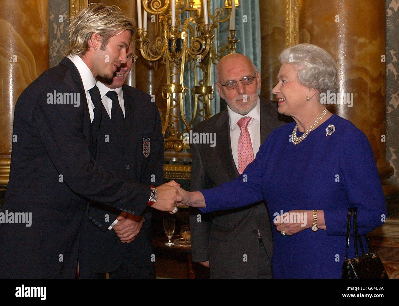Royal shaking hands blue dress profile queen elizabeth ii hi-res stock ...