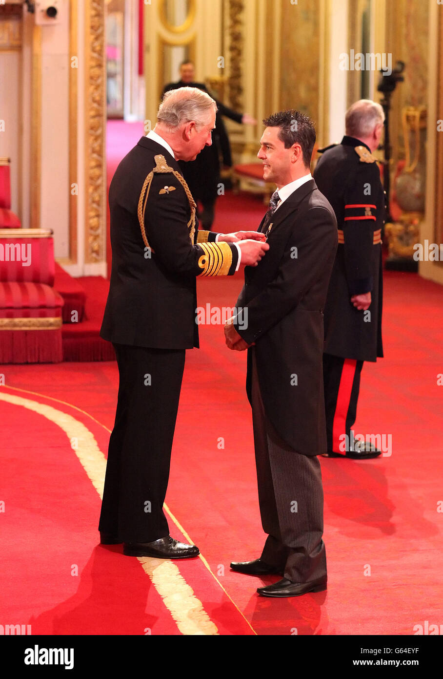Mark Colbourne receiving his Member of the British Empire (MBE) medal ...