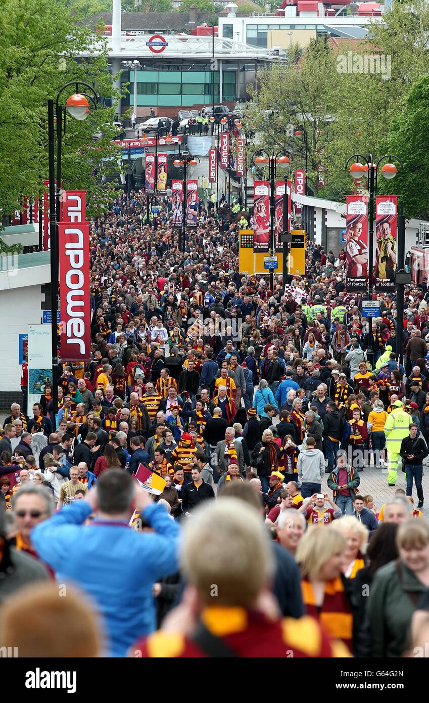 Football fans make their way down Wembley Way outside Wembley Stadium ...