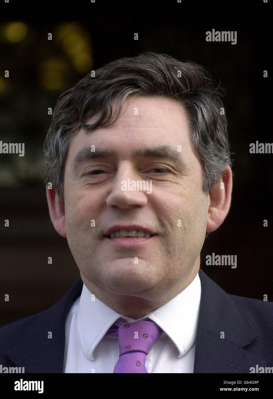Gordon Brown leaves for speech Stock Photo - Alamy