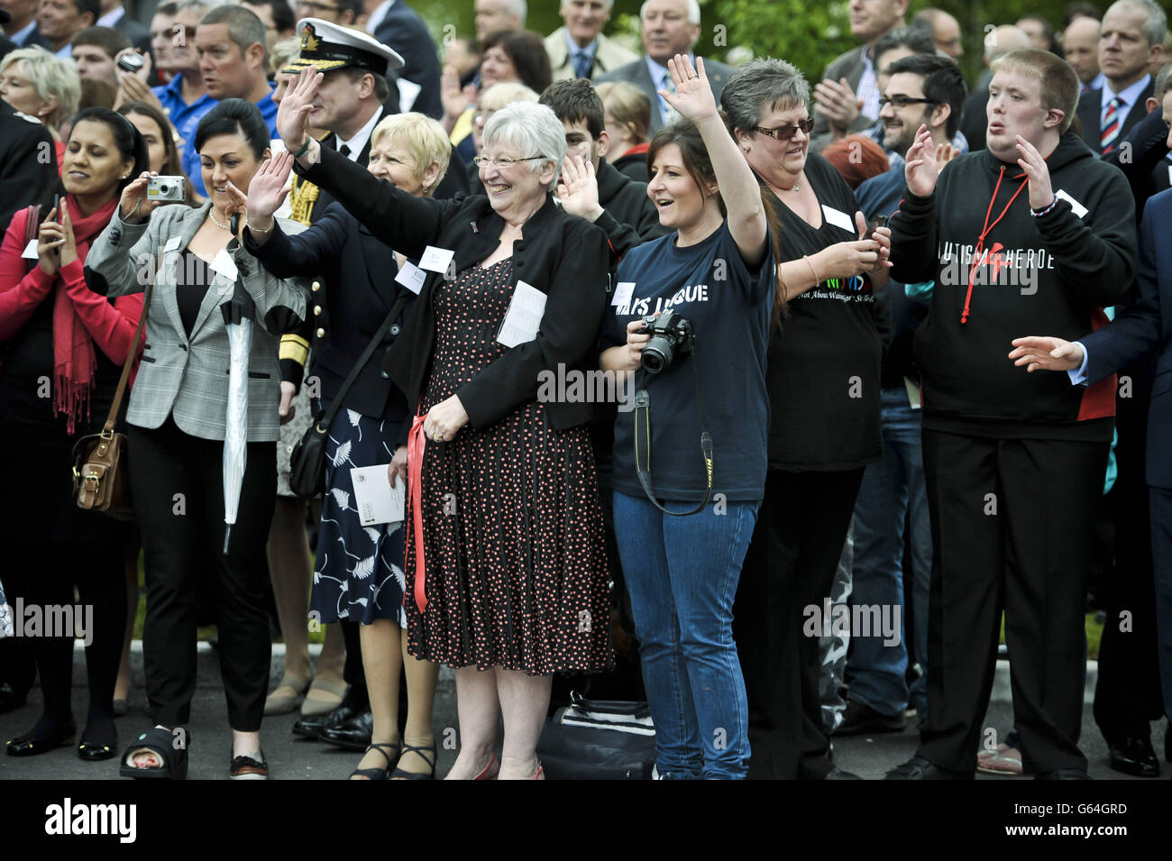 Crowd wave as the Duke of Cambridge and Prince Harry leave Tedworth ...