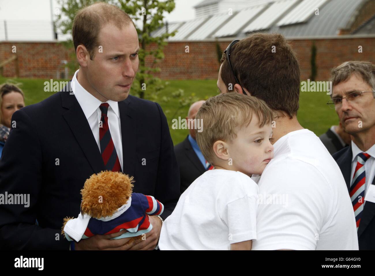 The Duke of Cambridge speaks Josh Boggi and his son, Jenson, at ...