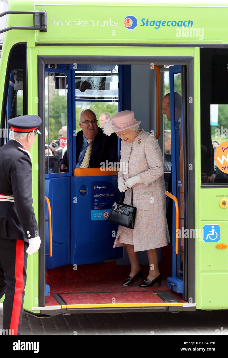 Queen Elizabeth II, and The Duke of Edinburgh arrive by guided bus at ...