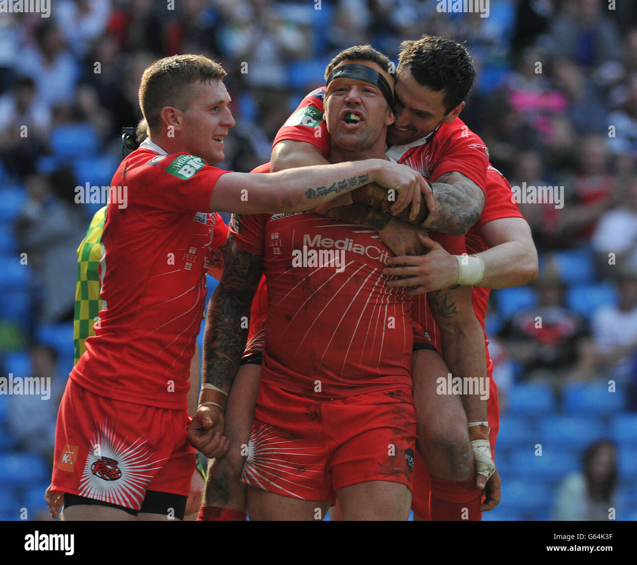 Salford City Reds' Jordan James (centre) celebrates after scoring the ...