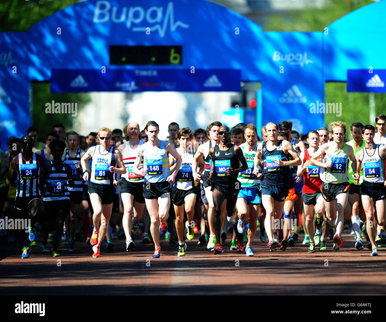 Athletics - 2013 Bupa London 10k - London. Mo Farah (centre right) on ...
