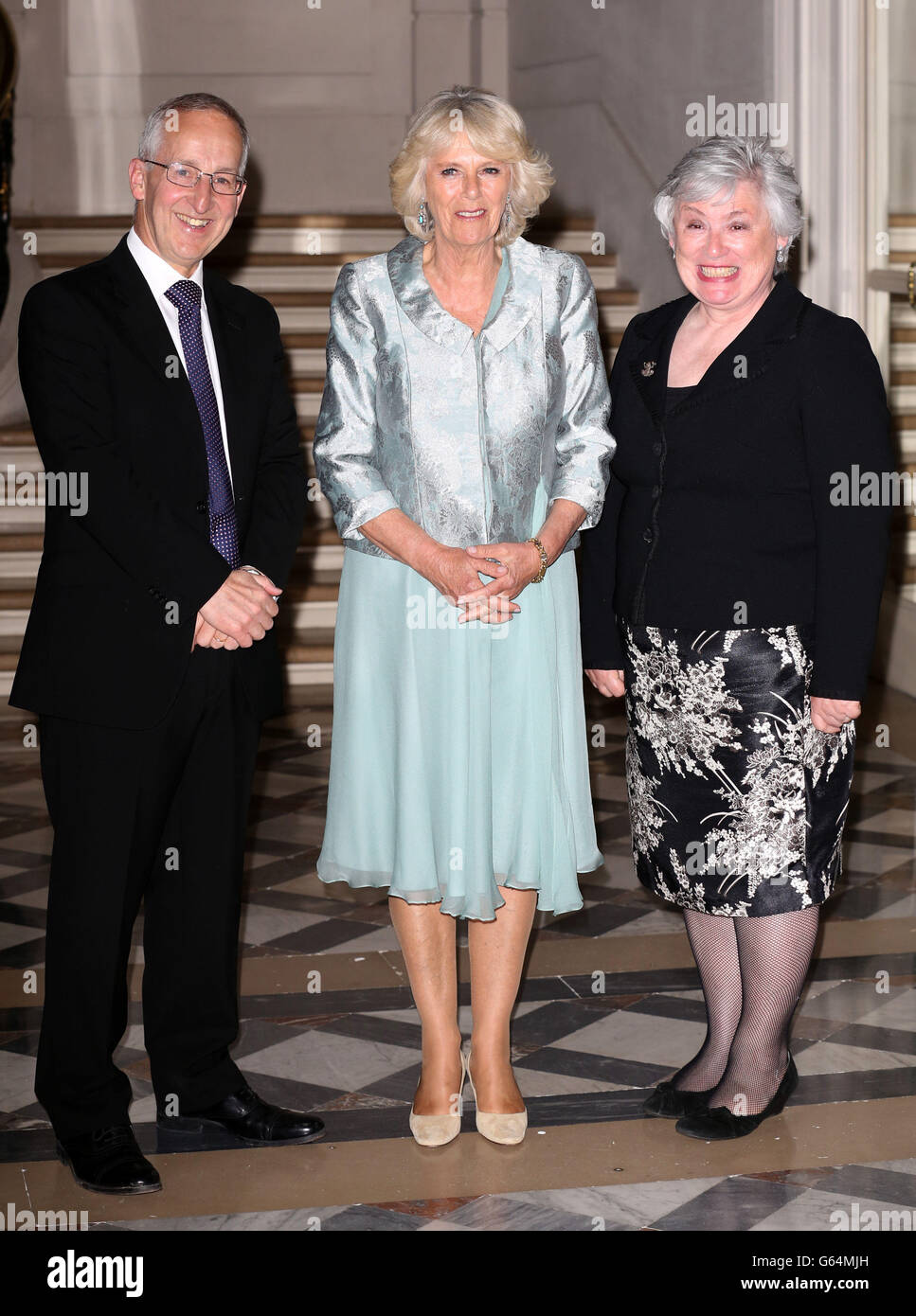 The Duchess of Cornwall is greeted by Sir Peter Ricketts, British ...