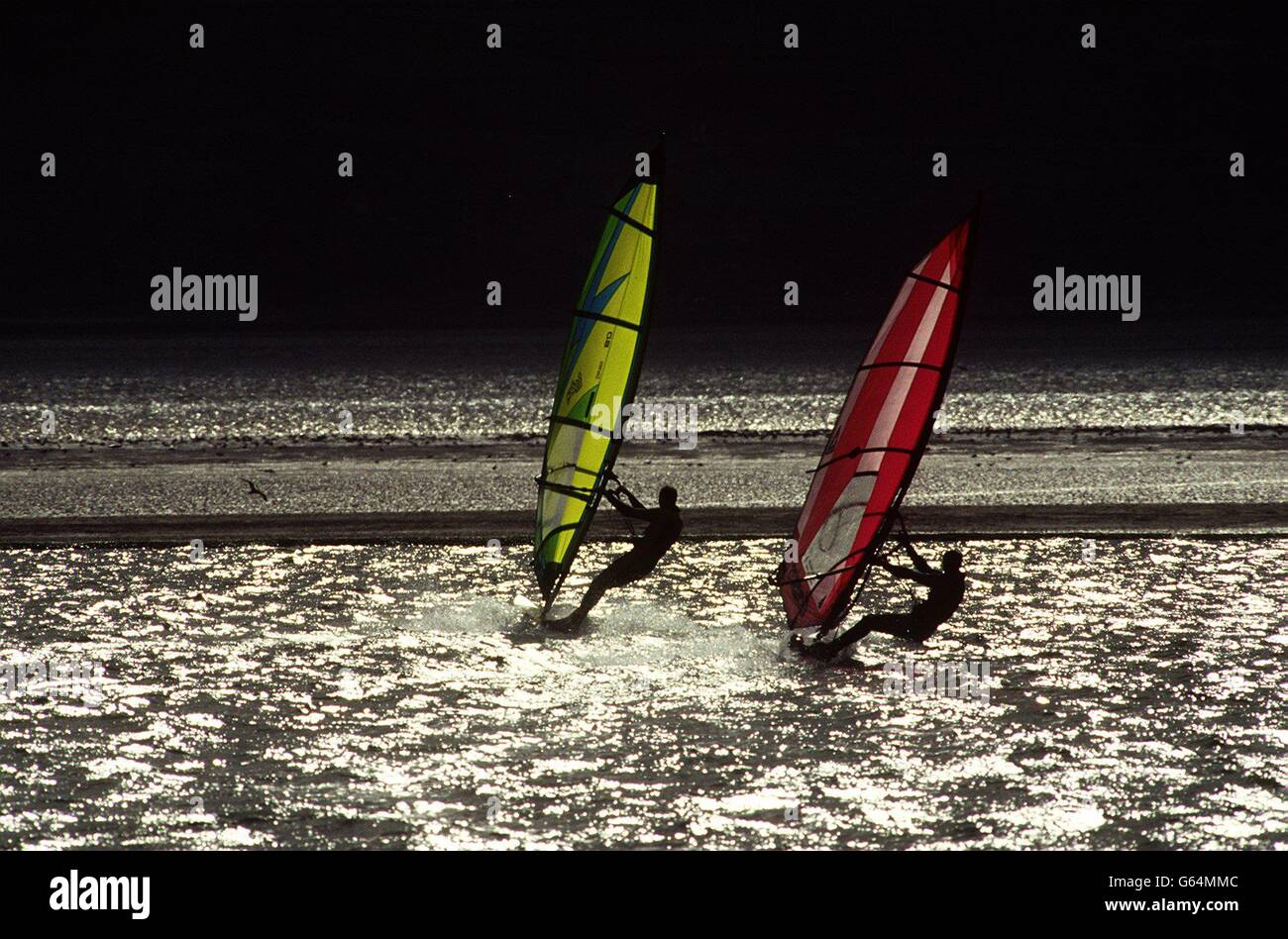 Windsurfing on the marine lake at west kirby hi-res stock photography ...