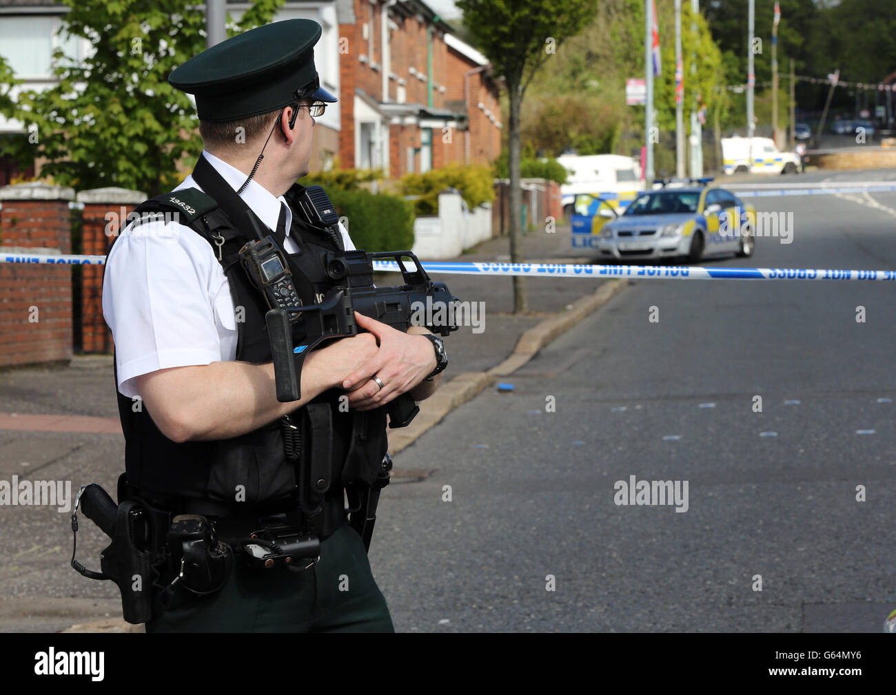 Armed police seal off an area in north Belfast after a double pipe bomb ...