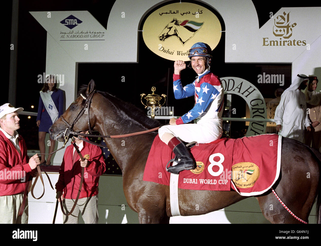 Jockey Jerry Bailey celebrates victory after riding Cigar home first to ...