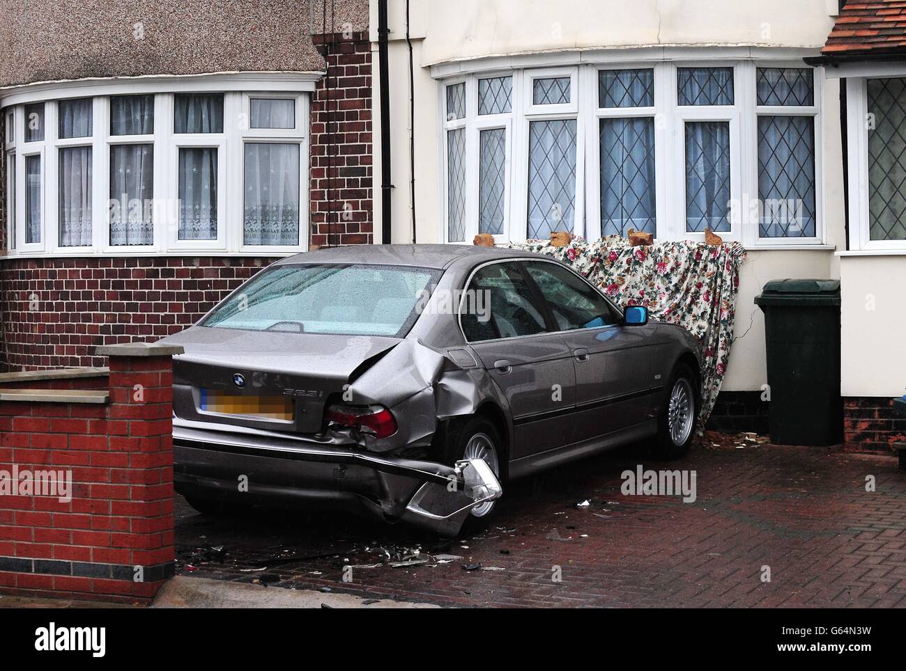 Car through house wall hi-res stock photography and images - Alamy