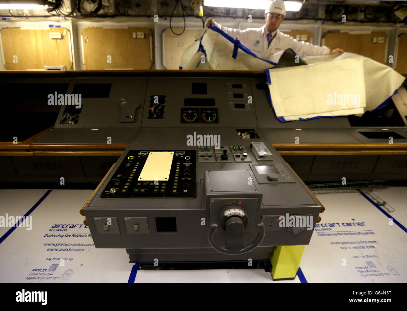 BAE Systems Mark Hughes removes covers to show the interiors of the ...