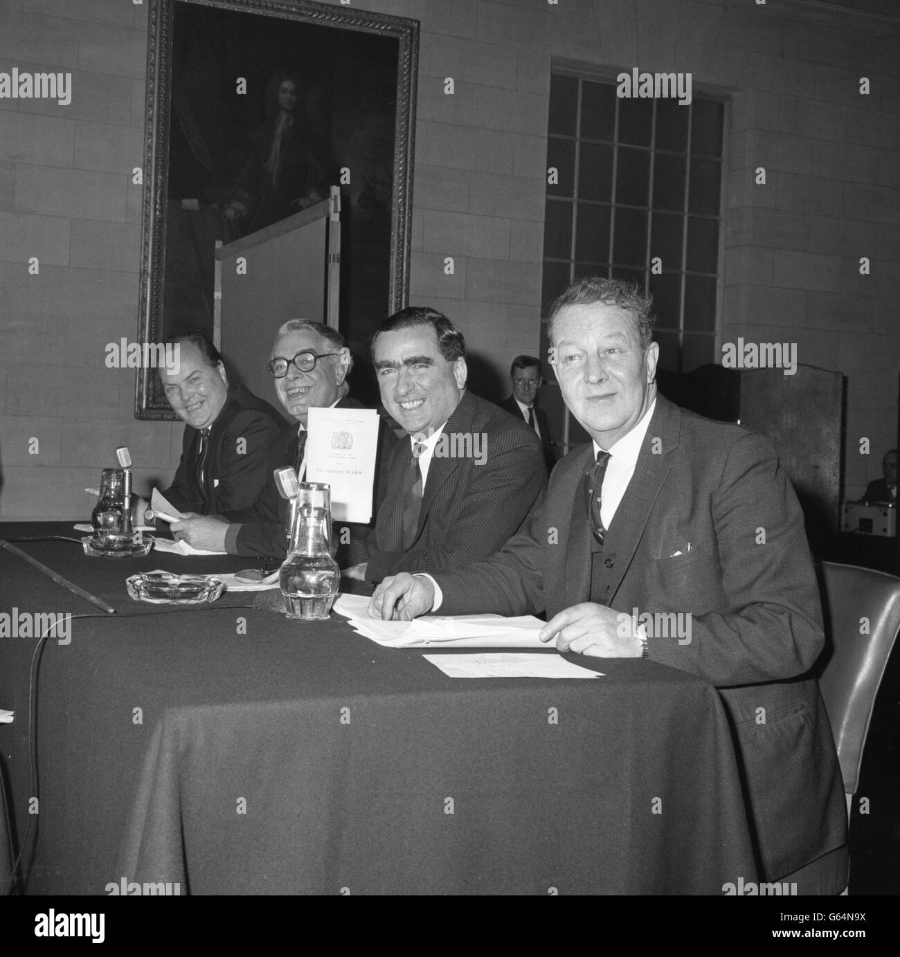 Defence ministers are pictured in a cheerful mood at a press conference ...