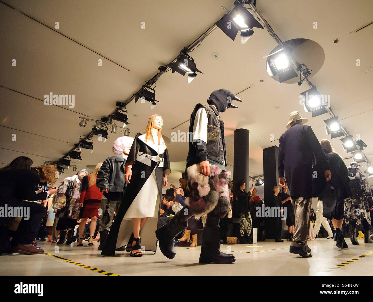 Models wear various designs by graduates at the Royal College of Art ...