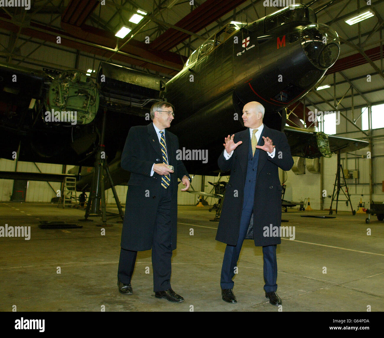 Conservative Party leader Iain Duncan Smith walks underneath a ...