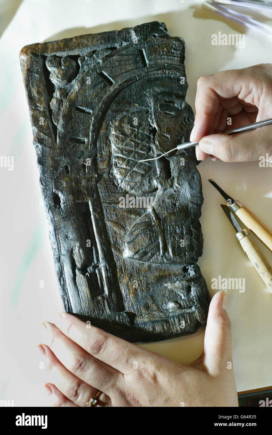 Sue Bickerton, Conservator at the Mary Rose Trust works on a piece of ...