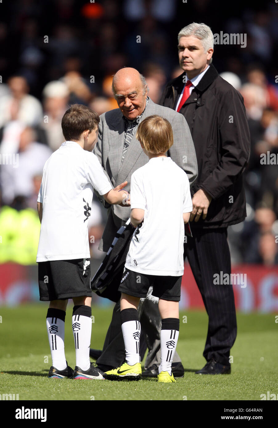 Fulhams owner mohamed al fayed meets the mascots hi-res stock ...