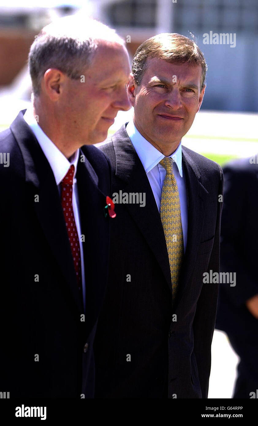The Duke of York walks from his aircraft with the British Ambassador ...