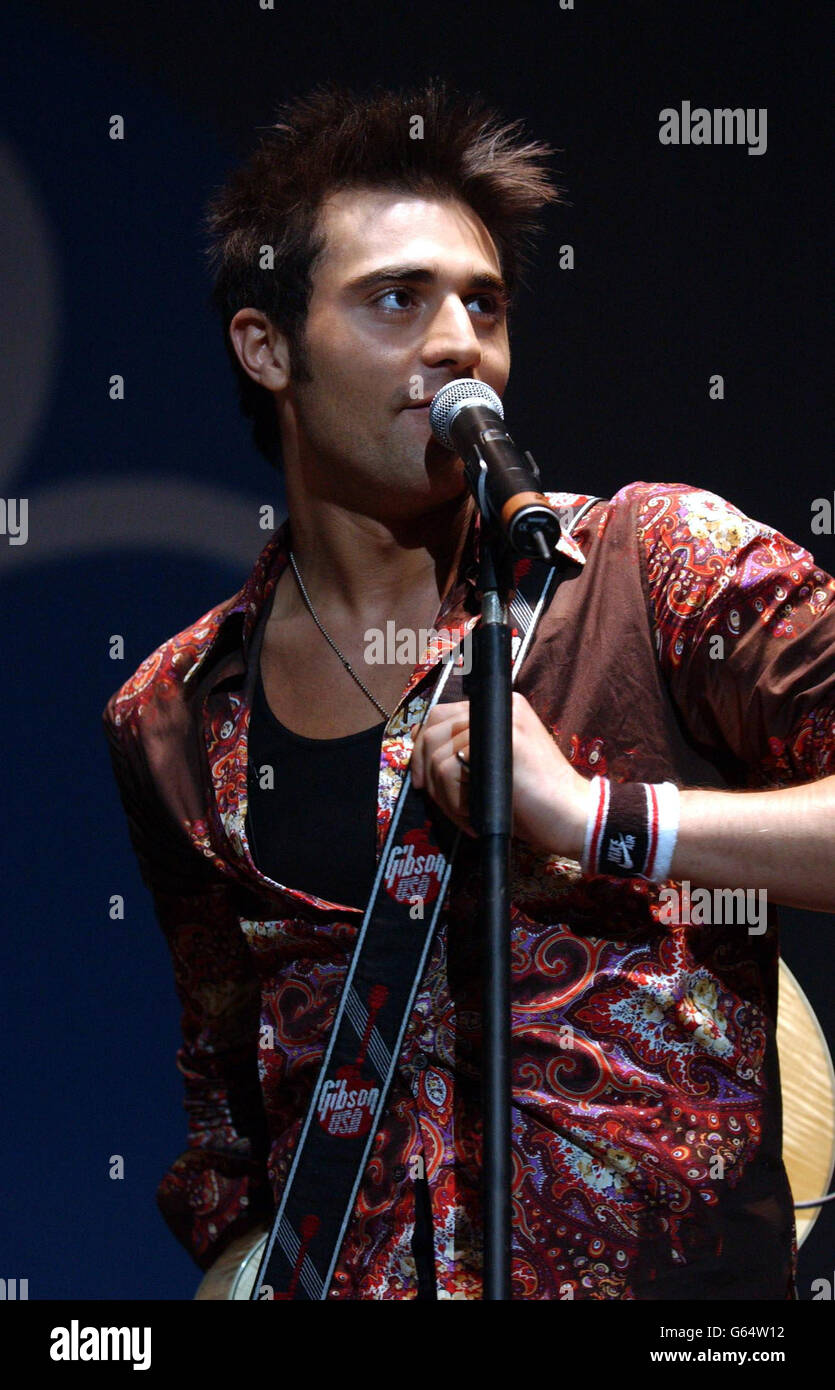 Pop star celebrity performing 1 2 half length microphone hi-res stock ...