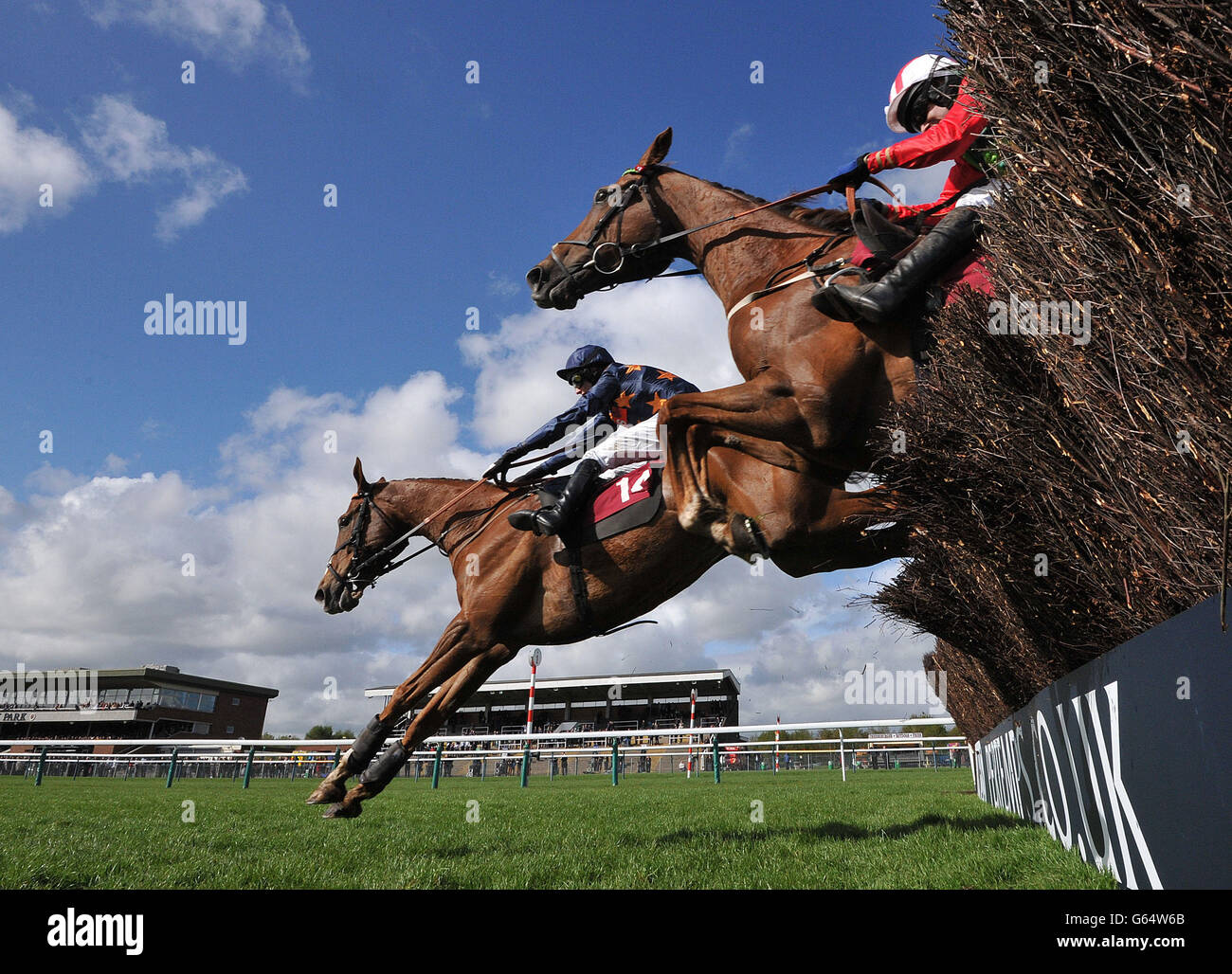 Fairy Rath ridden by Tom Cannon (left) clears the last fence to win the ...