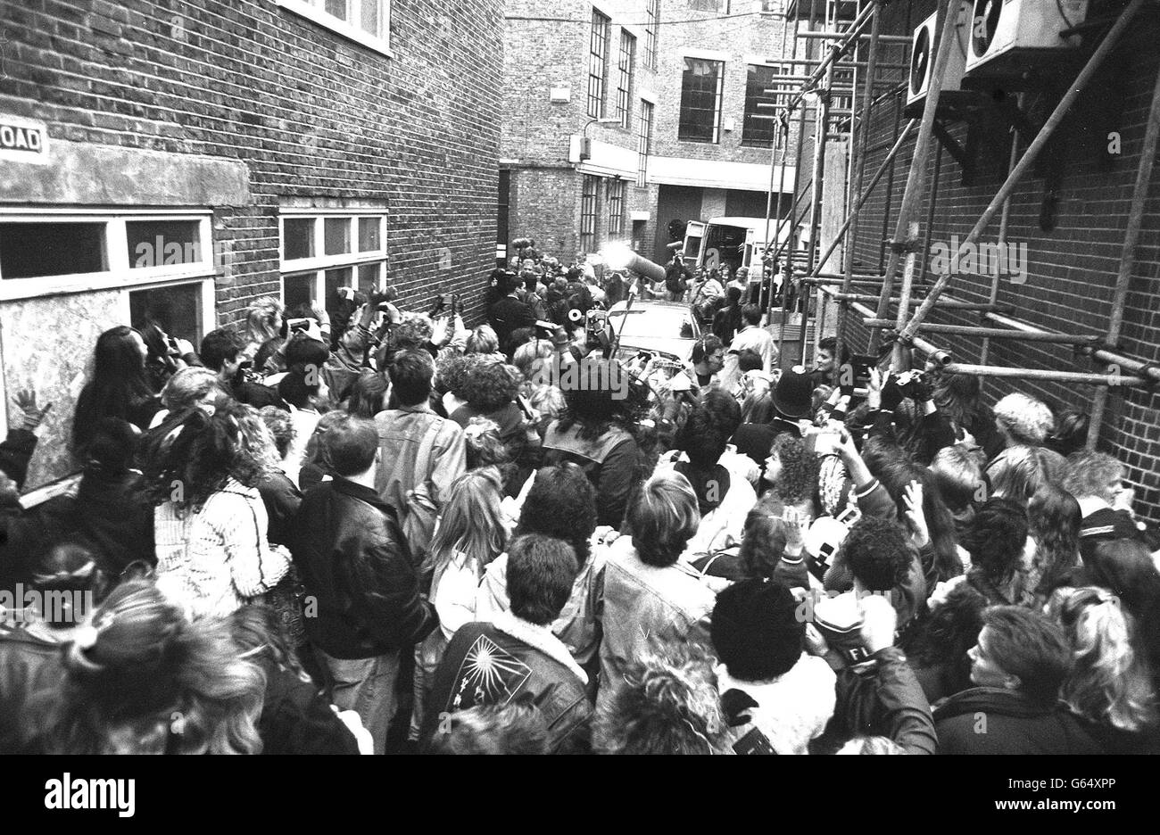 Hundreds of screaming pop fans Stock Photo - Alamy