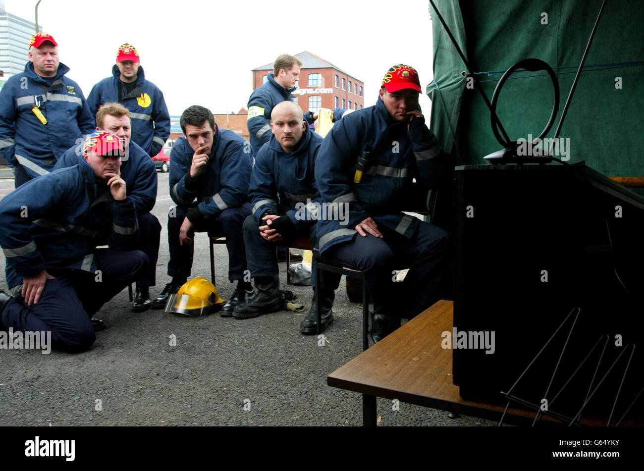 Firefighters strike picketline tv demonstrating watching hi-res stock ...