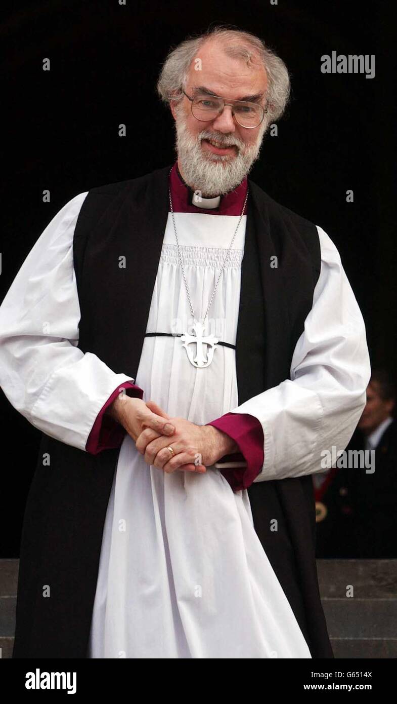 Dr Rowan Williams stands on the steps outside St Paul's Cathedral in ...
