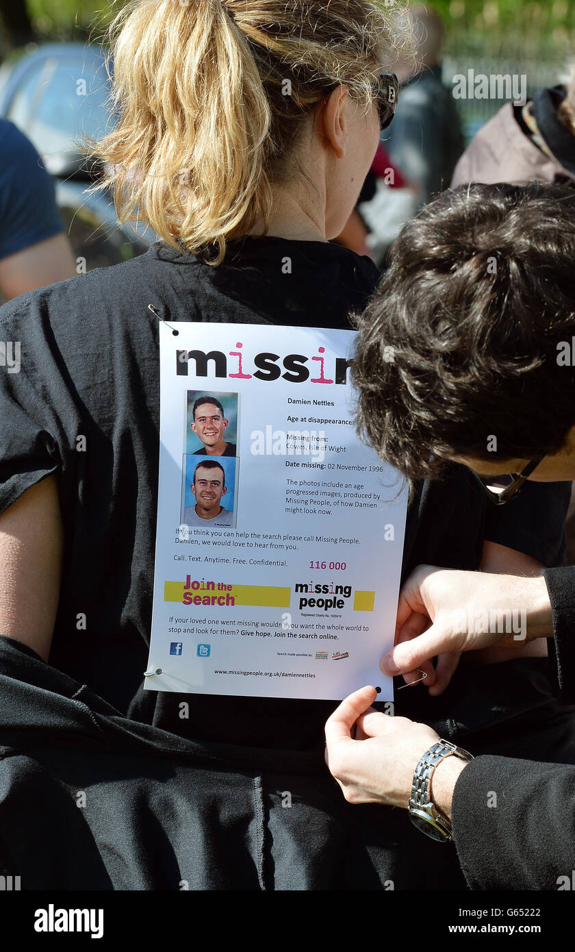 A female runner having a picture and details of a relative pinned on ...