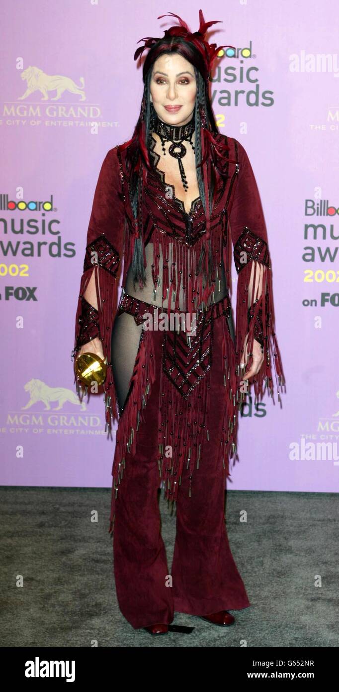 Singer Cher poses for photographers with her 'Artist Achievement Award ...