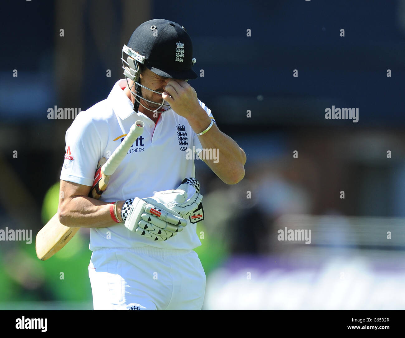 England's Nick Crompton walks of after being caught by dean Brownlie ...