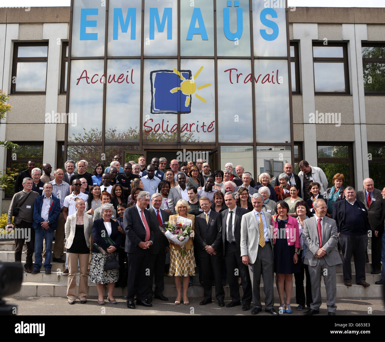 The Duchess of Cornwall, is greeted by an Emmaus Resident during a ...