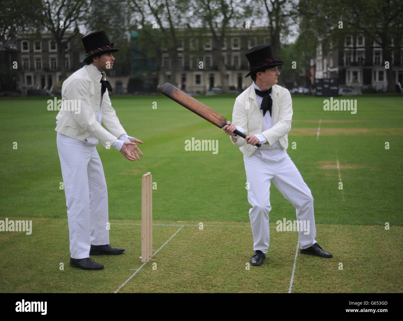 Cricketers dressed in Victorian costume recreate an old wood cutting ...