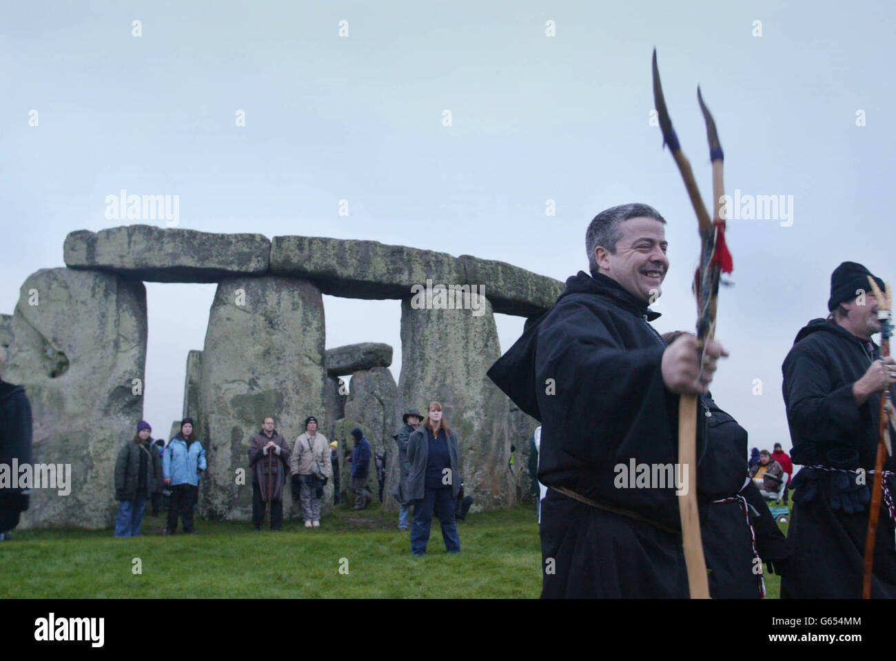 Crowds gather at Stonehenge in Wiltshire to watch the sunrise on the ...