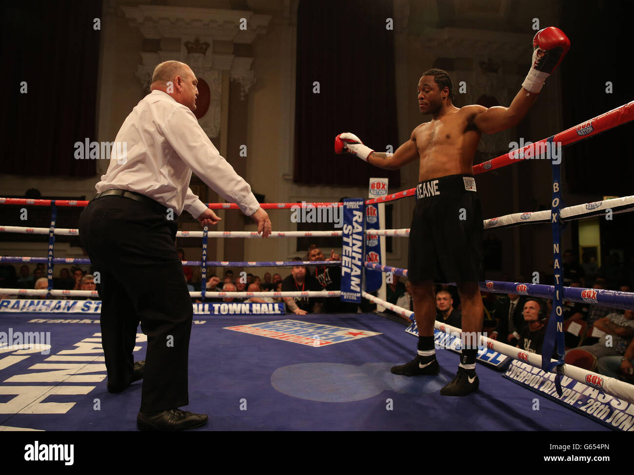 Chris Keane stands trying to beat the count in the 2nd round by referee ...