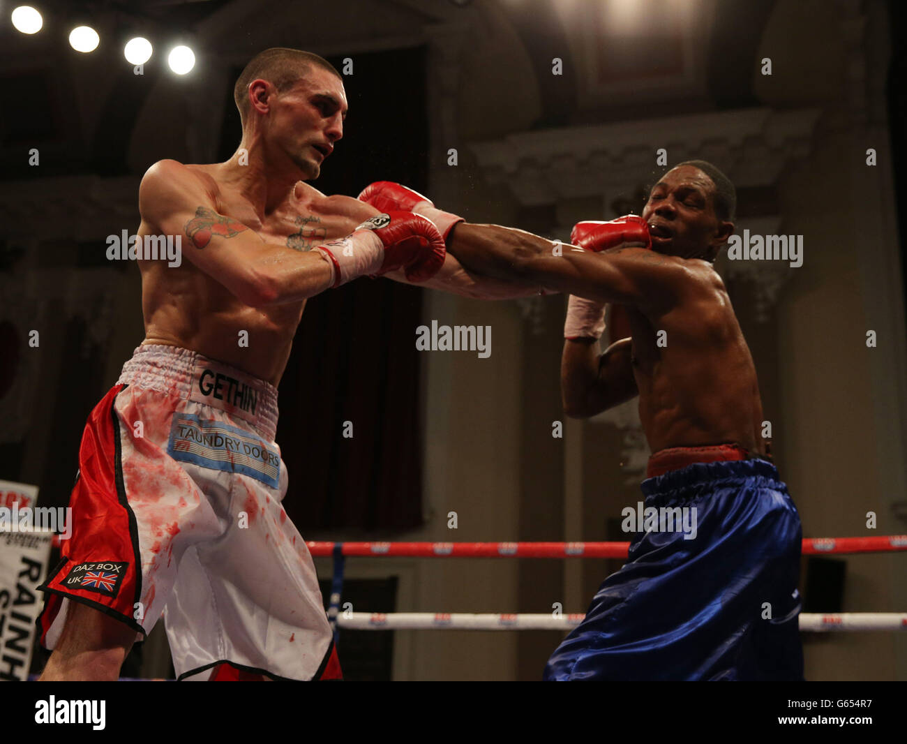Martin Gethin (left) during his 7th round defeat to Ammeth Diaz during ...