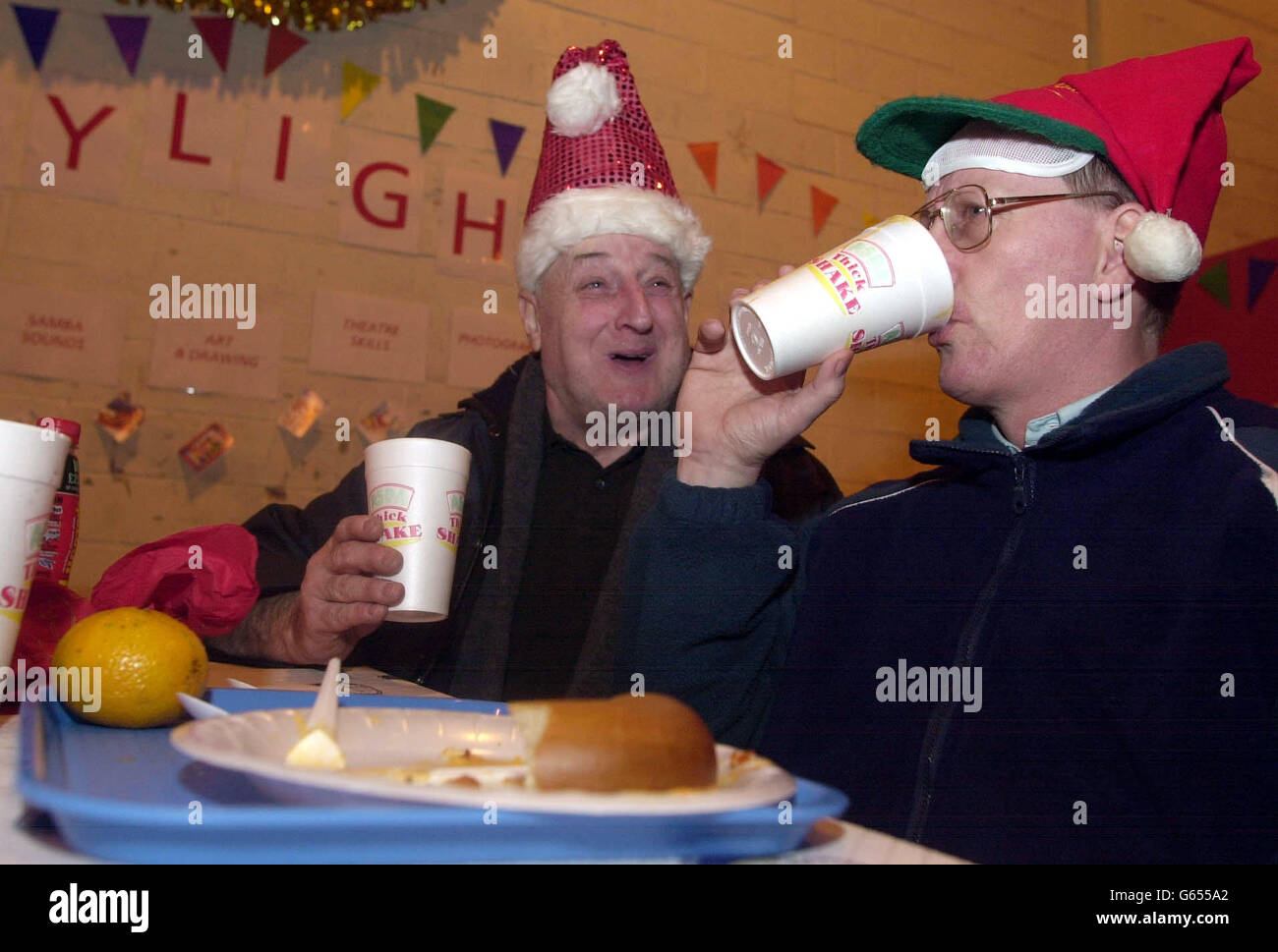 Homeless people eating in shelter hi-res stock photography and images ...
