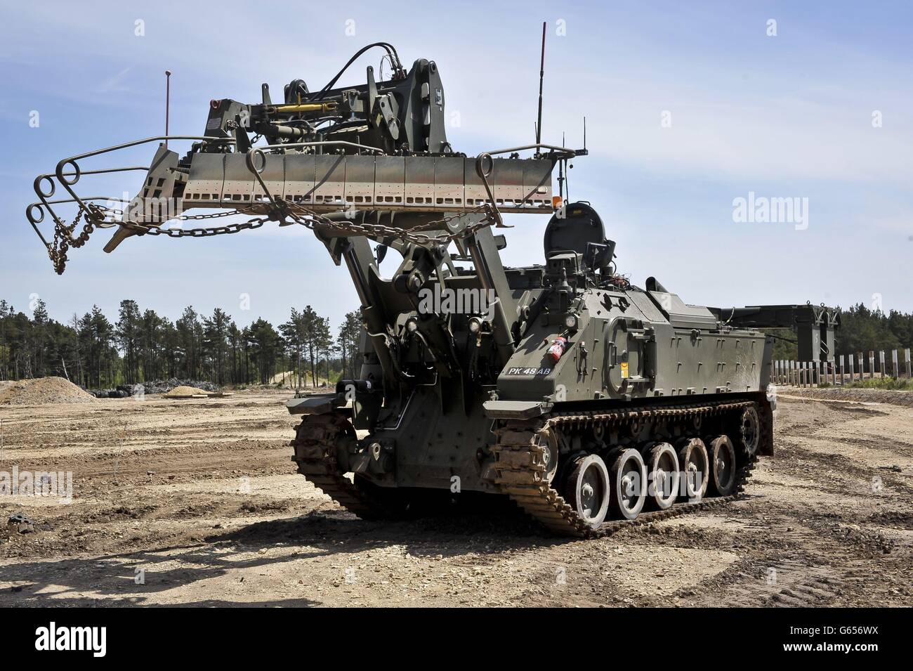 A Terrier armoured digger in the mine clearance role, which is entirely ...