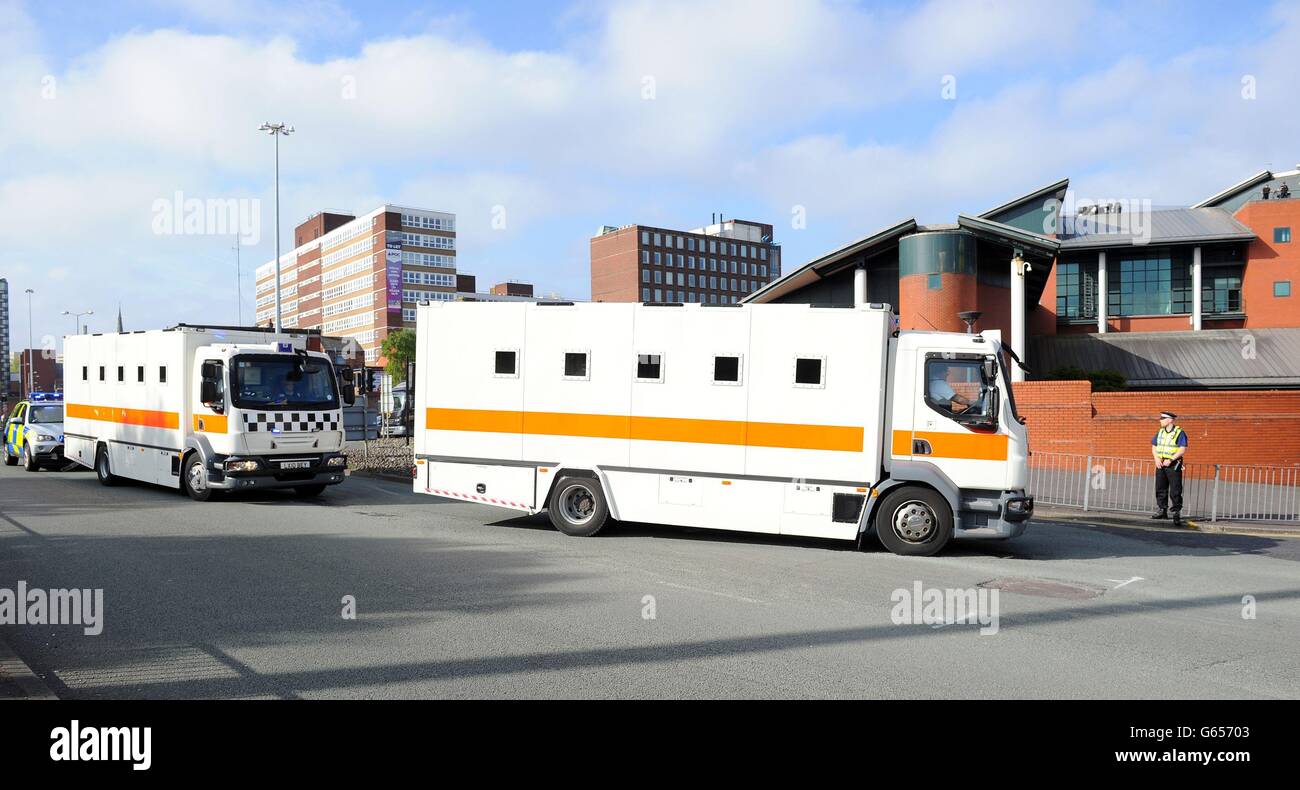 Prison vans arrive with a police escort at Preston Crown Court, where ...