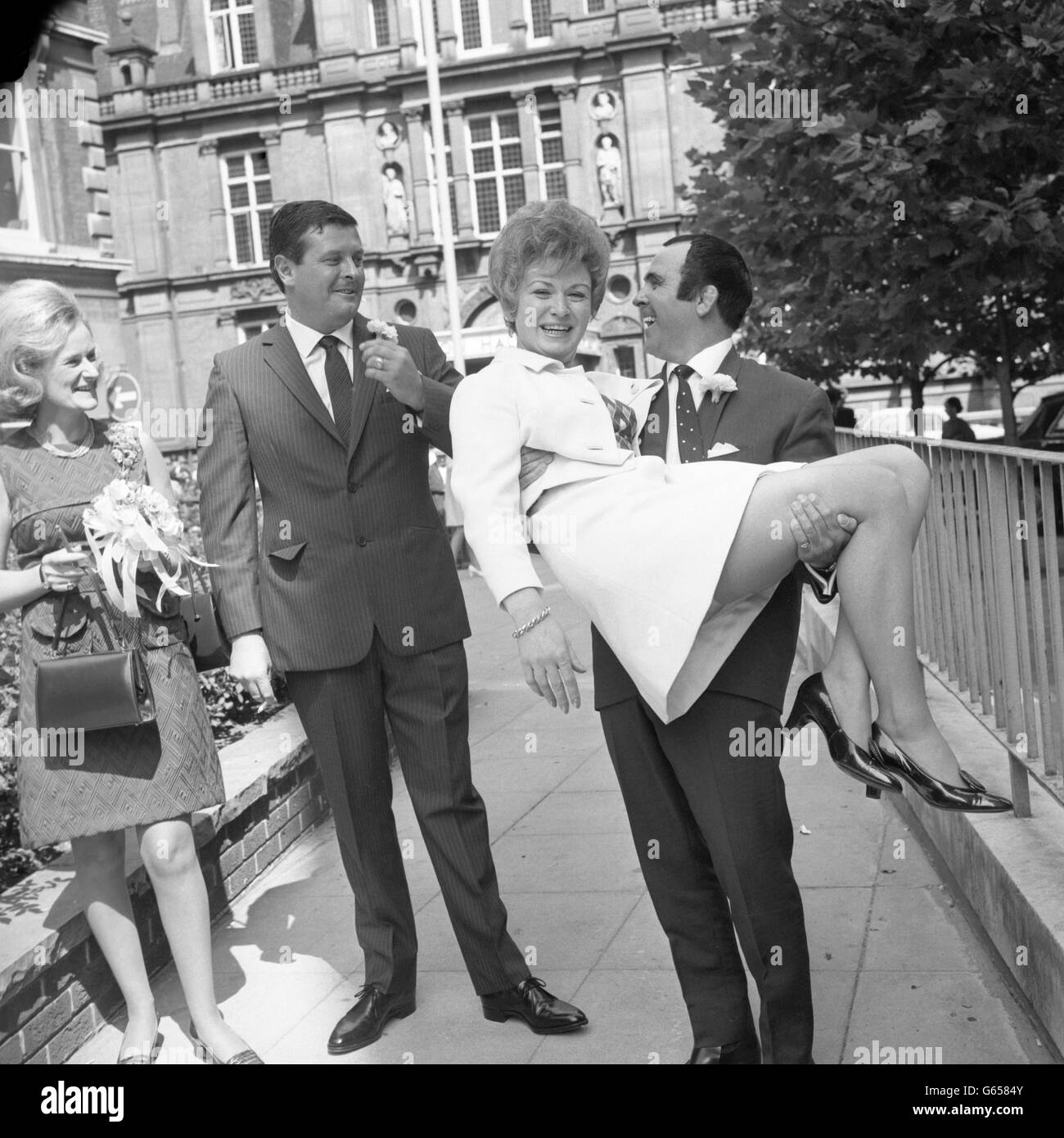 A Bride Swept Off Her Feet By Guest Mick Mcmanus Was The Former Miss Margaret Penman Looking On